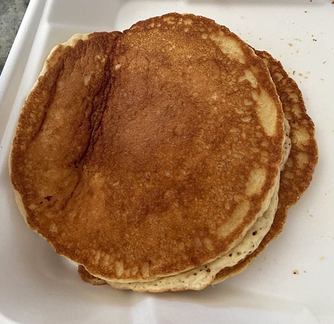 Pancakes so golden, they belong in Fort Knox! These fluffy discs of joy are the breakfast equivalent of a warm hug.
