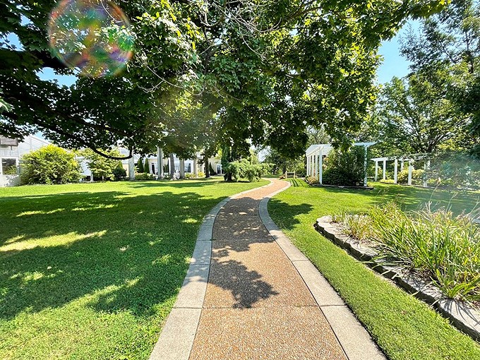 Follow the yellow brick... er, gravel road! This winding path promises adventures through manicured gardens and hidden nooks.