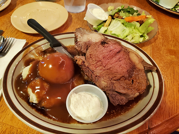A meal fit for royalty! This prime rib, surrounded by all the fixings, is so good it might just make you forget about your diet... and your name.