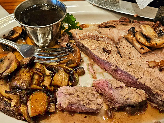 Behold the star of the show: prime rib fit for a king (or kaiser). Juicy, perfectly pink, and ready to make your taste buds do the polka.