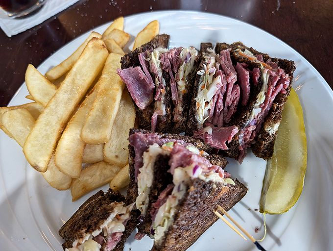 Reuben, oh Reuben, wherefore art thou so delicious? With a side of crispy fries, it's a match made in comfort food heaven.