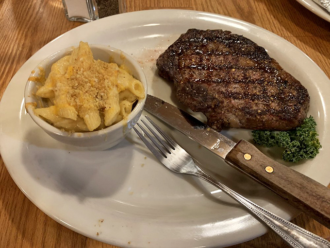 A steak that could tame the wildest bronco, paired with mac & cheese creamier than a desert mirage.