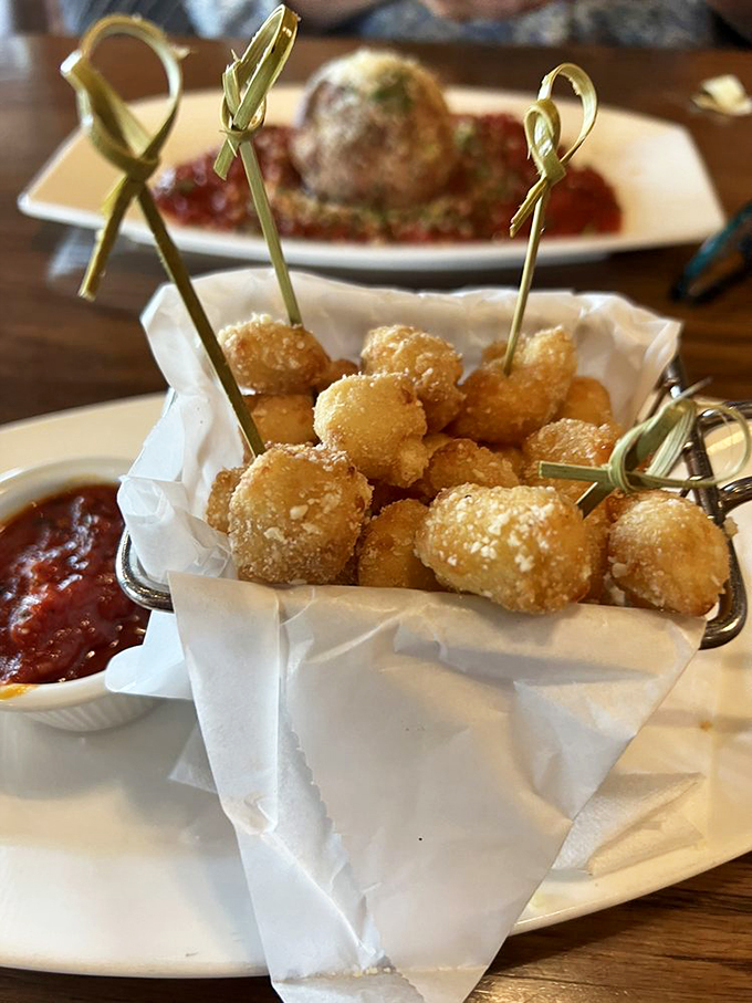 "Sconnie Staple" cheese curds: proof that sometimes, the best things in life are deep-fried and come with a side of marinara.
