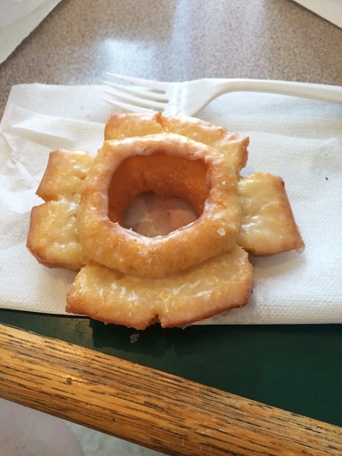 The sour cream glazed: a donut so perfectly crafted, it could make a grown man weep... tears of pure, sugary joy, of course.