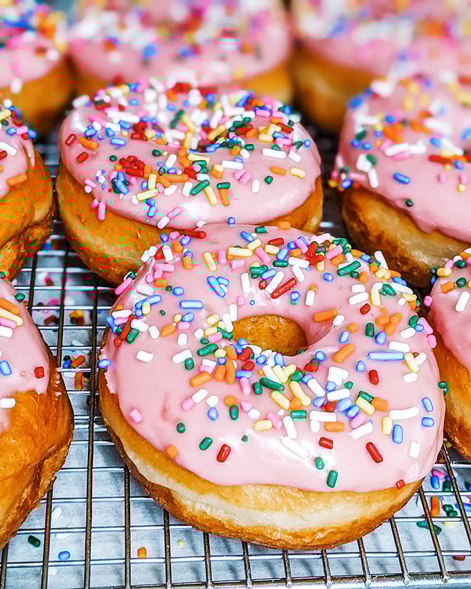 Pretty in pink! These sprinkled strawberry donuts are like edible confetti for your mouth.