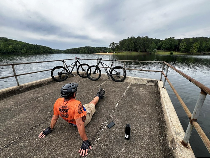 Pedal to the metal… or should we say, pedal to the puddle? These cyclists are taking a breather, soaking in views that would make Lance Armstrong brake.