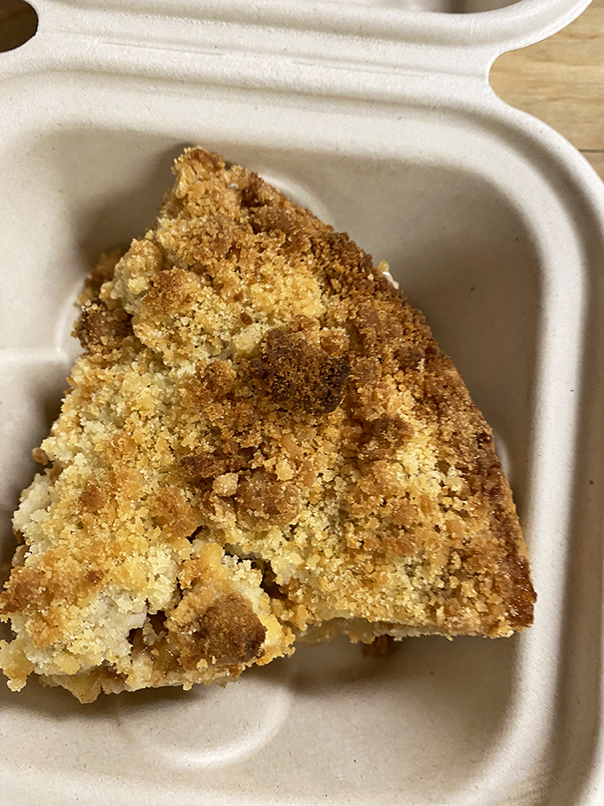 Crumb topping perfection! It's like someone sprinkled delicious fairy dust all over this heavenly slice of pie.