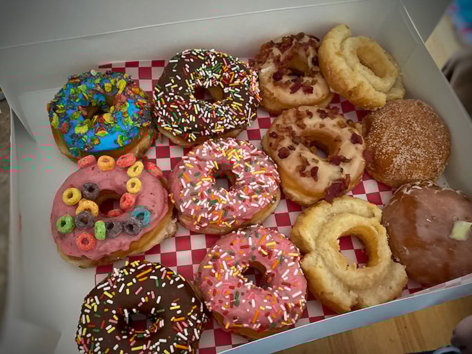 A rainbow of rings! This box of joy proves that donuts, like life, are best enjoyed with a variety of flavors.