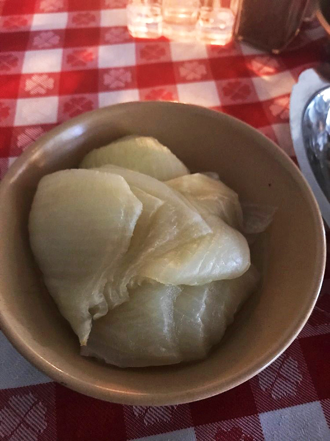 Sweet, caramelized perfection. These baked onions are the unsung heroes of the plate, adding a touch of sweetness to balance the savory.