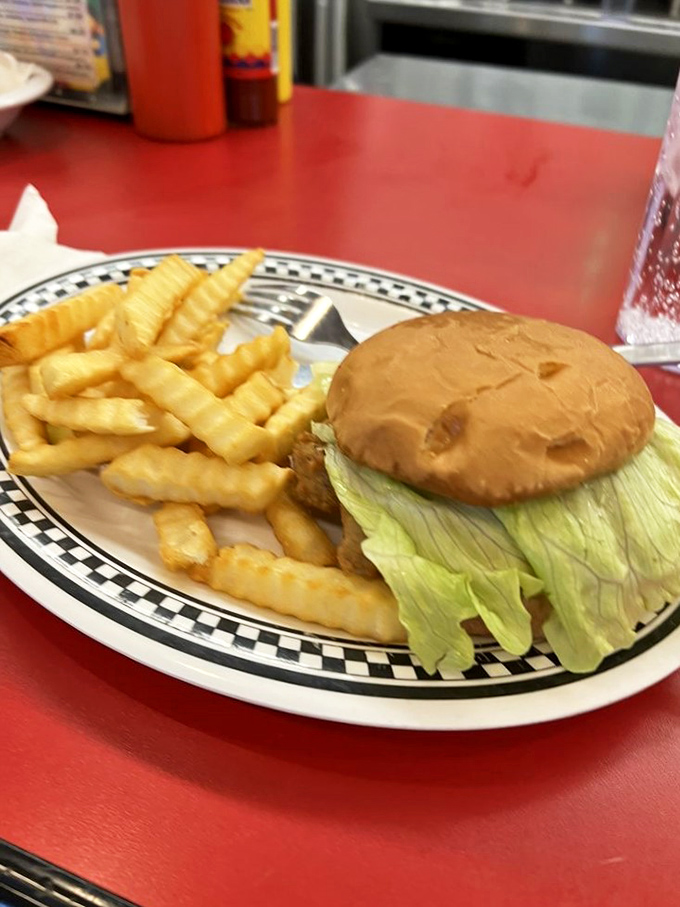 Behold, the classic American burger in its natural habitat. Simple, unpretentious, and ready to satisfy that primal hunger.