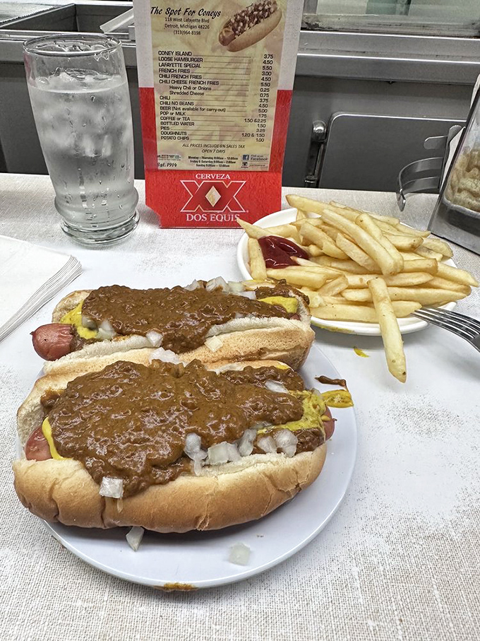 Double trouble never looked so good. Two coney dogs, ready to tag-team your hunger into submission. Napkins at the ready!