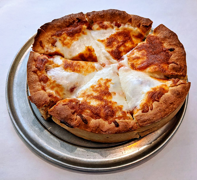 The Leaning Tower of Pizza! This deep dish creation is stacked higher than the Willis Tower and twice as satisfying.