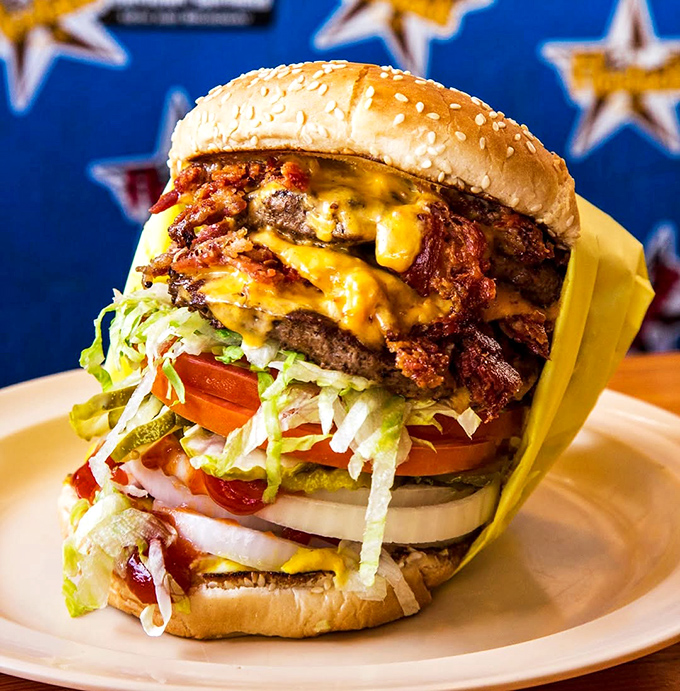 Behold, the tower of power! This double bacon cheeseburger is less a sandwich and more a meaty skyscraper of joy.