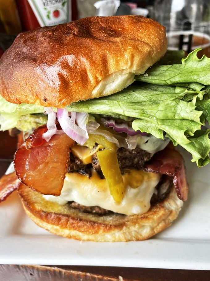 Double the patty, double the fun! This burger is so big, it might need its own area code.
