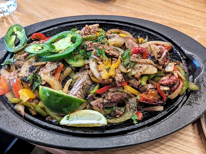 Sizzle, sizzle, little skillet, what a feast you bring! These fajitas are hotter than a Michigan summer and twice as welcome.