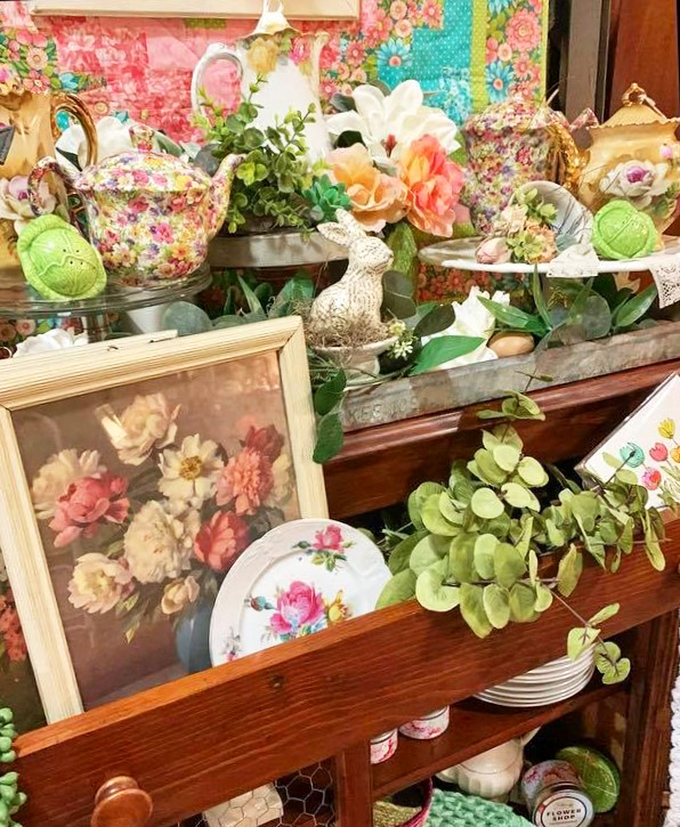 A floral explosion that would make Mother Nature jealous! This display is a feast for the eyes, mixing vintage charm with blooming beauty. Your allergies won't know what hit 'em!