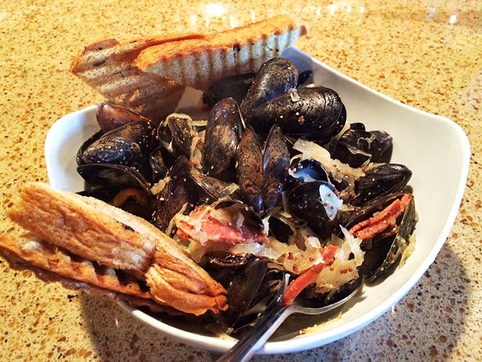 A seafood symphony in a bowl! These mussels and kielbasa are like the Lennon and McCartney of appetizers &ndash; unexpected, but pure harmony.