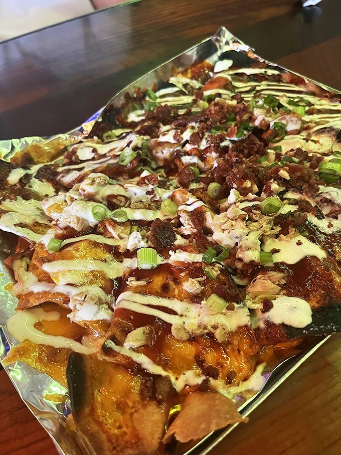 Nacho average nachos! This tray of cheesy, meaty goodness is what happens when BBQ and Tex-Mex have a delicious love child. Grab a fork (or don't)!