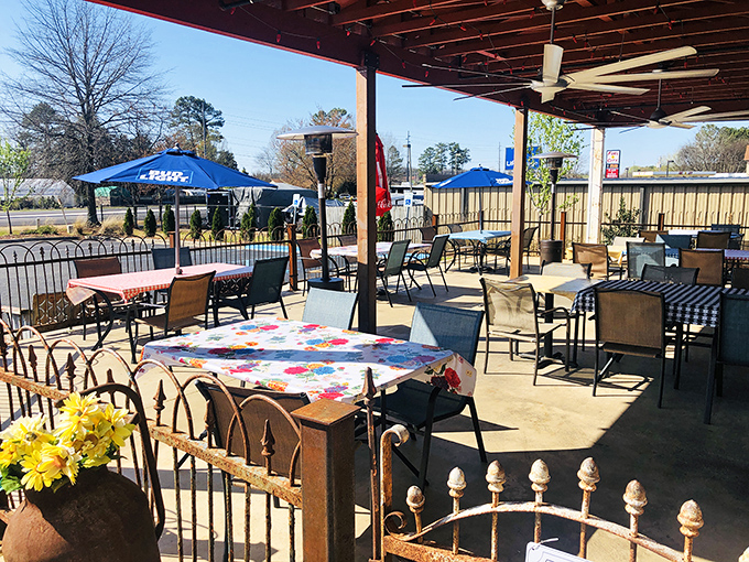 Al fresco feasting at its finest! Champy's outdoor dining area is where sunshine, good vibes, and great food come together for a perfect Southern soir&eacute;e.