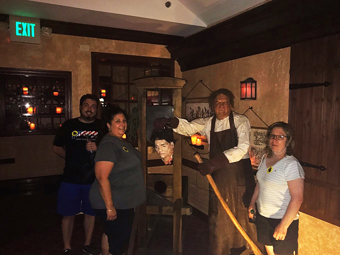 "Say cheese!" Or in this case, "Say torture!" Visitors pose with a ghoulish host for a truly unforgettable photo op.