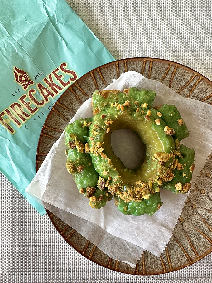 Green with envy? You will be! This pistachio-packed ring is the crown jewel of the donut kingdom, fit for nutty royalty.