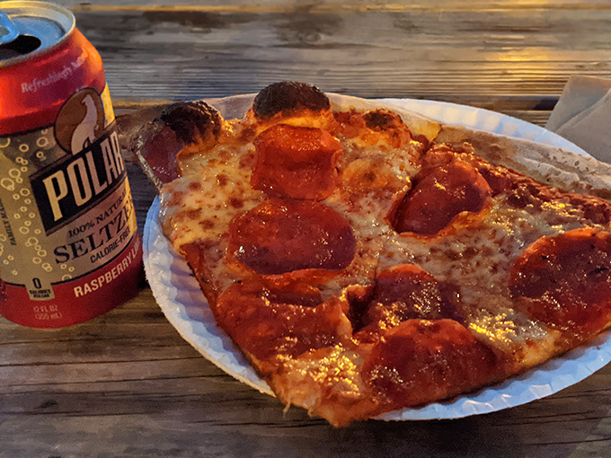 Pizza and seltzer: a match made in culinary heaven. This crispy pepperoni pie is begging to be devoured.