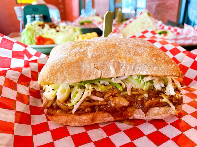 Hold onto your taste buds, folks! This sandwich is packing more heat than a Southern summer, with enough slaw to cool you down just in time for another bite.