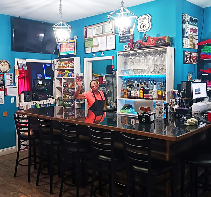 Cheers to vintage finds! This colorful bar area serves up a cocktail of nostalgia with a twist of Route 66 charm. Don't forget to tip your bartender... with stories!