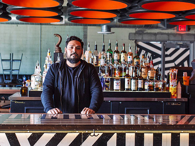 Meet your new best friend - the guardian of good times and keeper of the sacred cocktails. He's part mixologist, part time-travel guide.