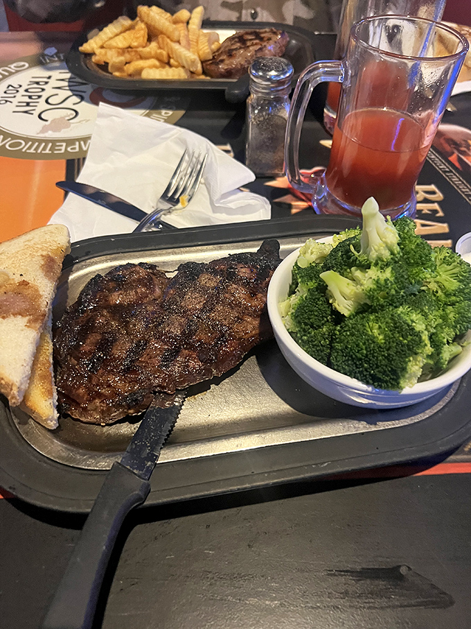 This steak isn't just a meal, it's a meaty meditation. Pair it with that vibrant broccoli for a balanced diet... of awesome.