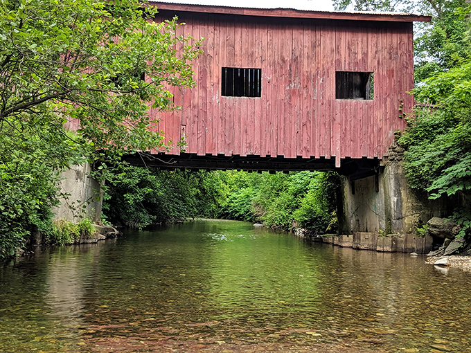 Who needs a red carpet when you've got a wooden catwalk? This rustic bridge invites you to strut your stuff over a babbling brook.