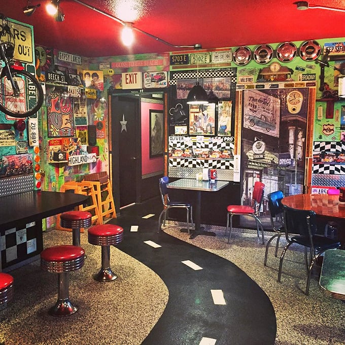 Warning: Nostalgia overload! This wall is like your grandpa's attic and a rock 'n' roll museum had a beautiful, chaotic baby.