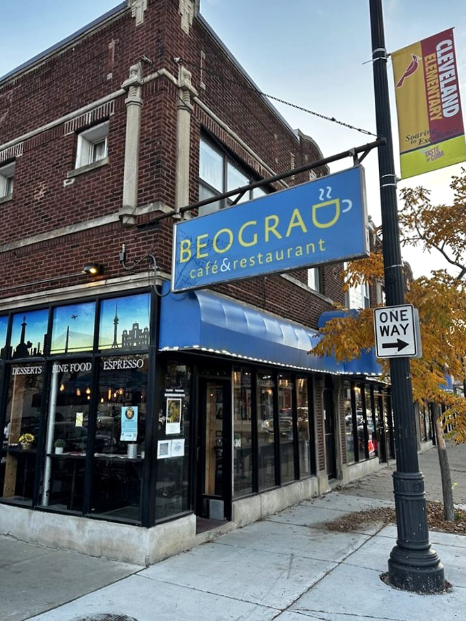 Vibrant blue awning and classic brick? Beograd Cafe's facade is like a Serbian postcard come to life.