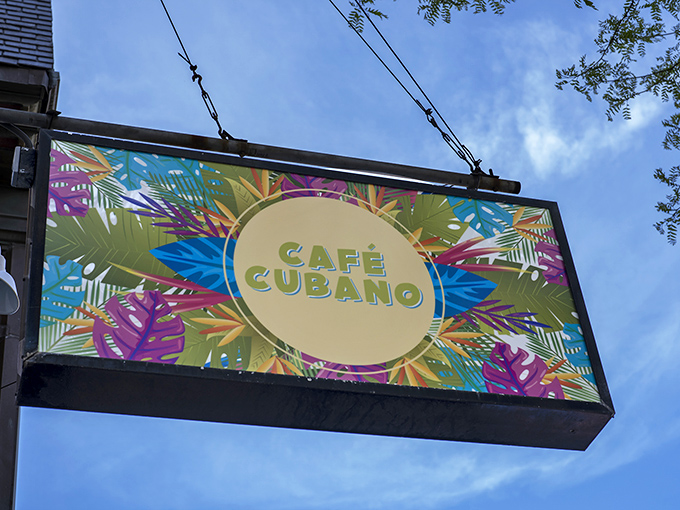 Palm leaves and pastel hues beckon you into this Cuban oasis. Prepare for a coffee experience that'll make Starbucks jealous.