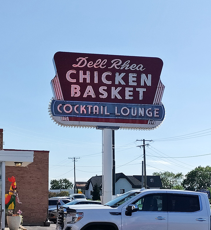 That neon chicken sign isn't just bright, it's a beacon of deliciousness. Dell Rhea's is where road trip dreams come true.
