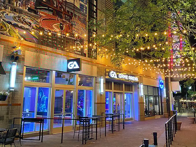 Esports central! Watch pixelated gladiators battle it out on the big screen while you perfect your own button-mashing skills.