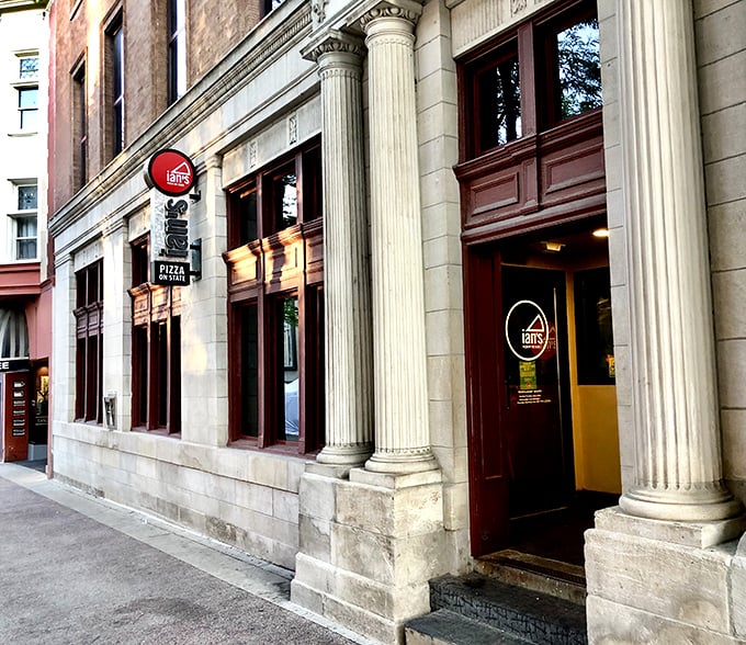Pizza party central! Ian's vibrant storefront is like a siren call to hungry night owls and adventurous eaters alike. It's where pizza meets pop art.