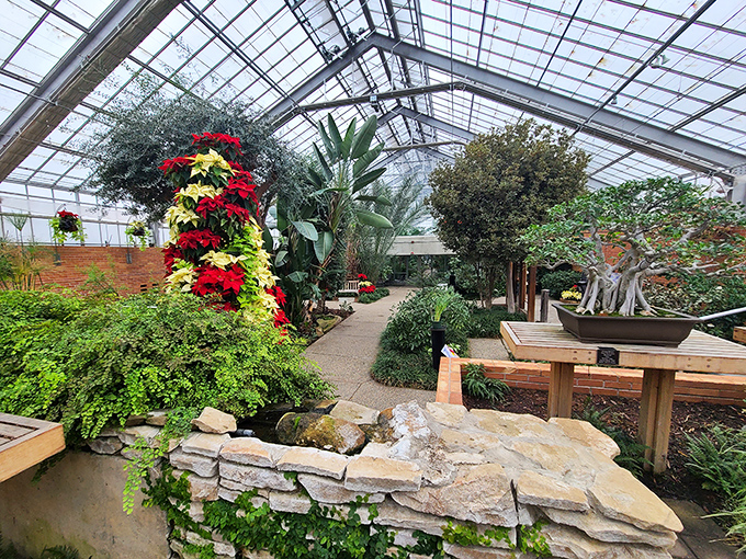 Metal meets petal! This sculpture looks like it's trying to outgrow the surrounding flora in a quirky garden competition.