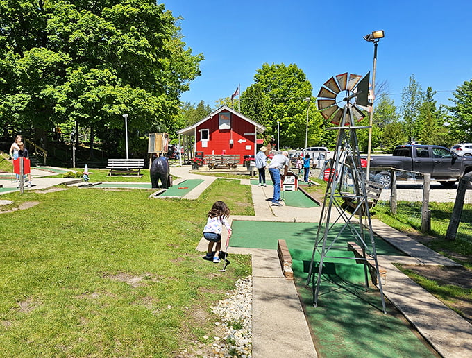 Step back in time at The Red Putter. Classic obstacles, vintage vibes, and putts that'll make you say "Gee whiz!" unironically.