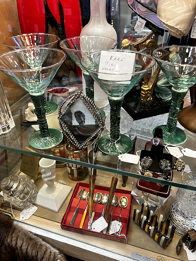 A wall of wonder! From crystal chandeliers to kitschy art, this display is like a "Where's Waldo?" of vintage delights.