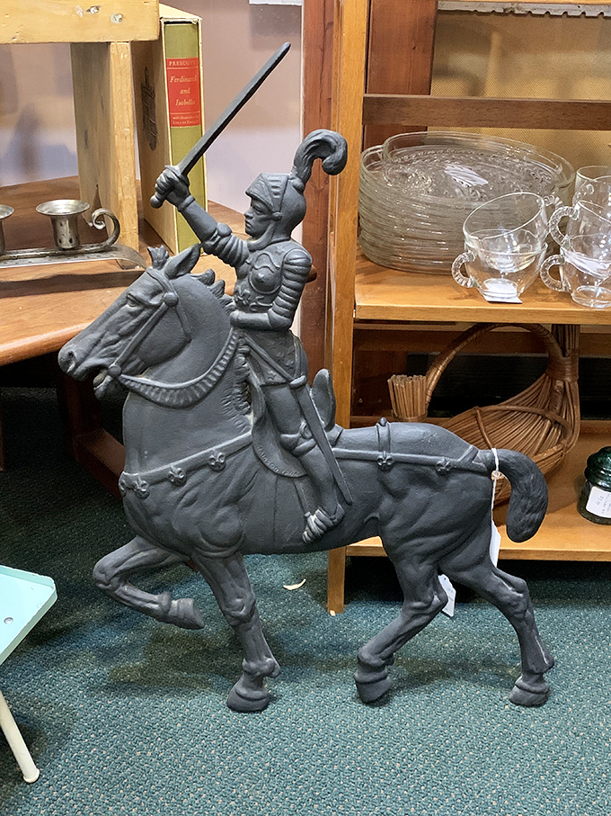 Charge! This gallant knight seems ready to defend your bookshelf from the invasion of e-readers and digital devices.