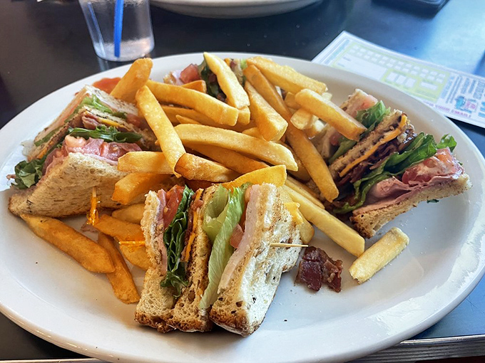 The club sandwich to end all club sandwiches! This triple-decker beauty is stacked higher than a '50s beehive hairdo.