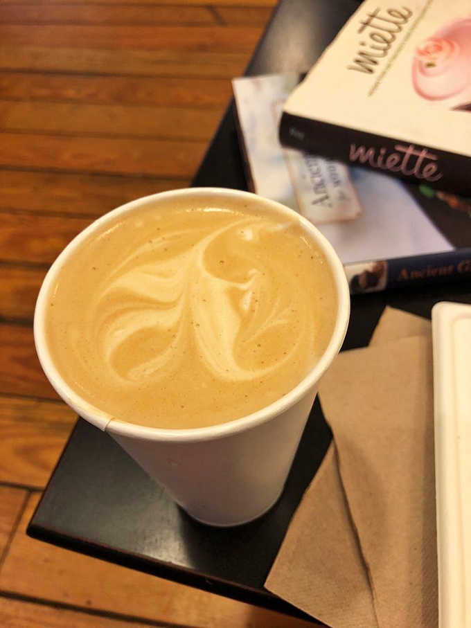 Coffee art so pretty, you almost don't want to drink it. Almost. Resistance is futile!