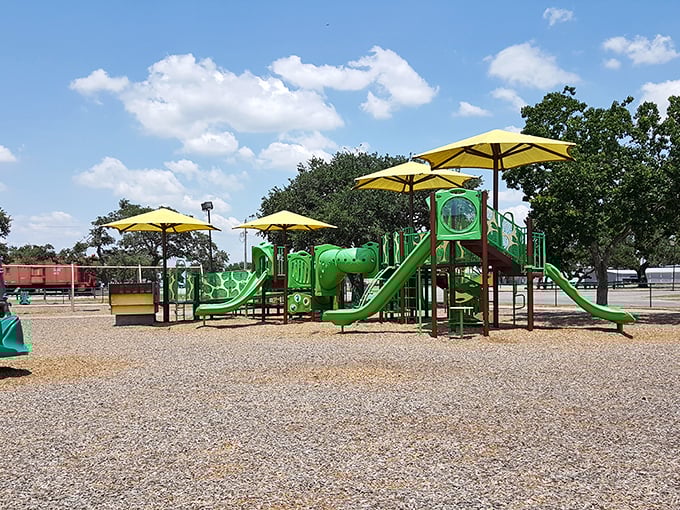 Cuero Municipal Park: Slide into fun at this colorful playground! It's like a miniature Disneyland, minus the long lines and overpriced mouse ears.
