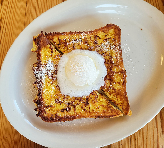 French toast fantasy! This golden-brown creation is ready to make your breakfast dreams come true, one syrupy bite at a time.