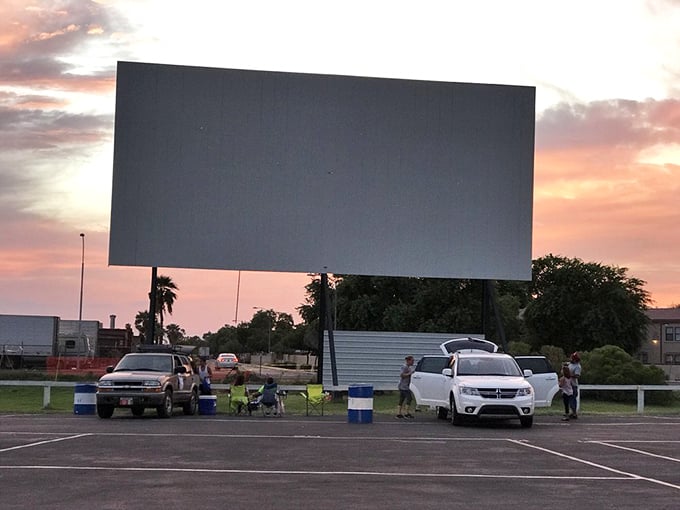 Alfresco cinema at its finest! These colorful canopies and picnic tables set the stage for a perfect movie night under the open sky.