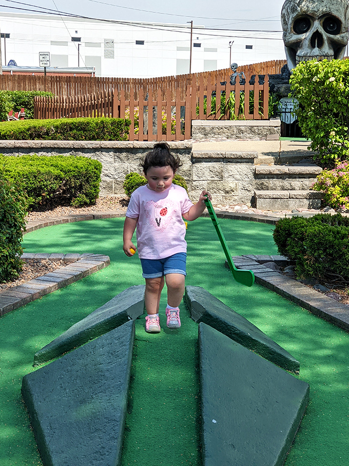 "Game on! These young ghost-busters are zapping their way through virtual ghouls. Who you gonna call? Probably Mom for more quarters!"