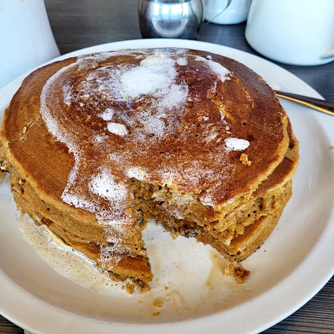 Pancakes so fluffy, they could double as pillows. Warning: may induce spontaneous happiness and uncontrollable syrup cravings.