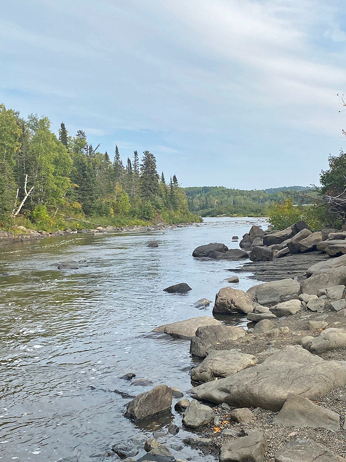 River of dreams: This isn't just any old stream. It's a liquid border, nature's own international dateline. Fish swim duty-free here!