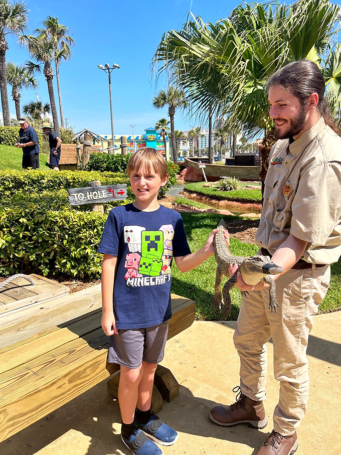 Meet your jungle guide! This friendly staff member is ready to help you navigate the wilds of mini-golf &ndash; no machete required.